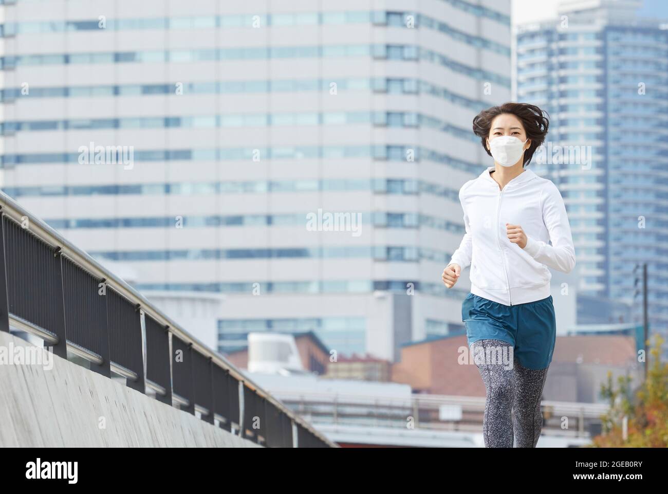 Japanese woman training outside Stock Photo - Alamy