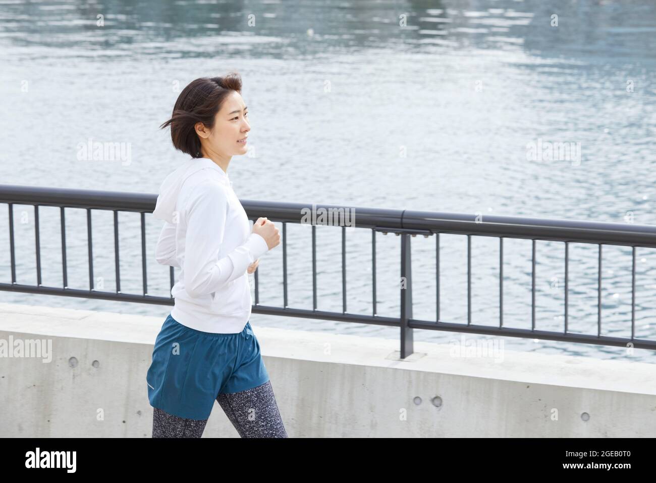 Japanese woman training outside Stock Photo - Alamy