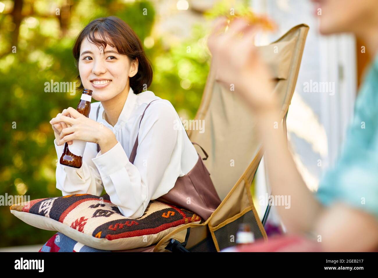 Japanese friends having a party in the garden Stock Photo - Alamy