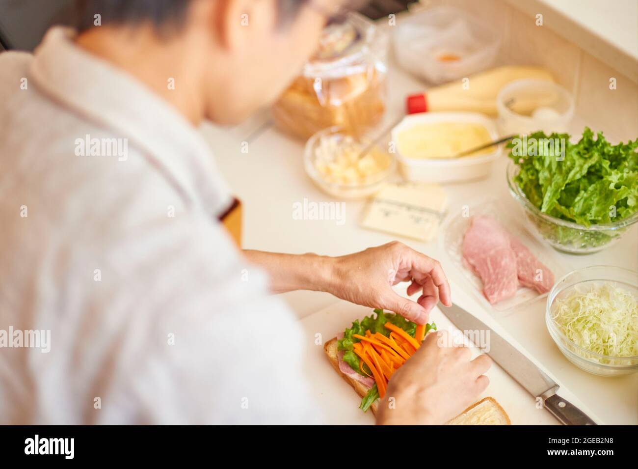 Japanese friends cooking at home Stock Photo - Alamy