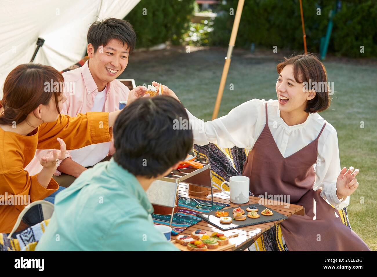 Japanese friends having a party in the garden Stock Photo - Alamy