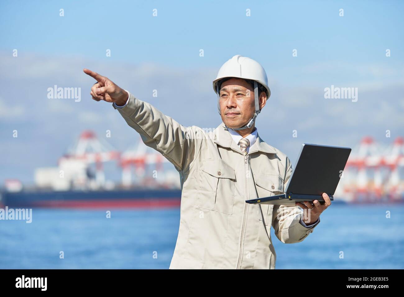 Japanese worker outside Stock Photo - Alamy