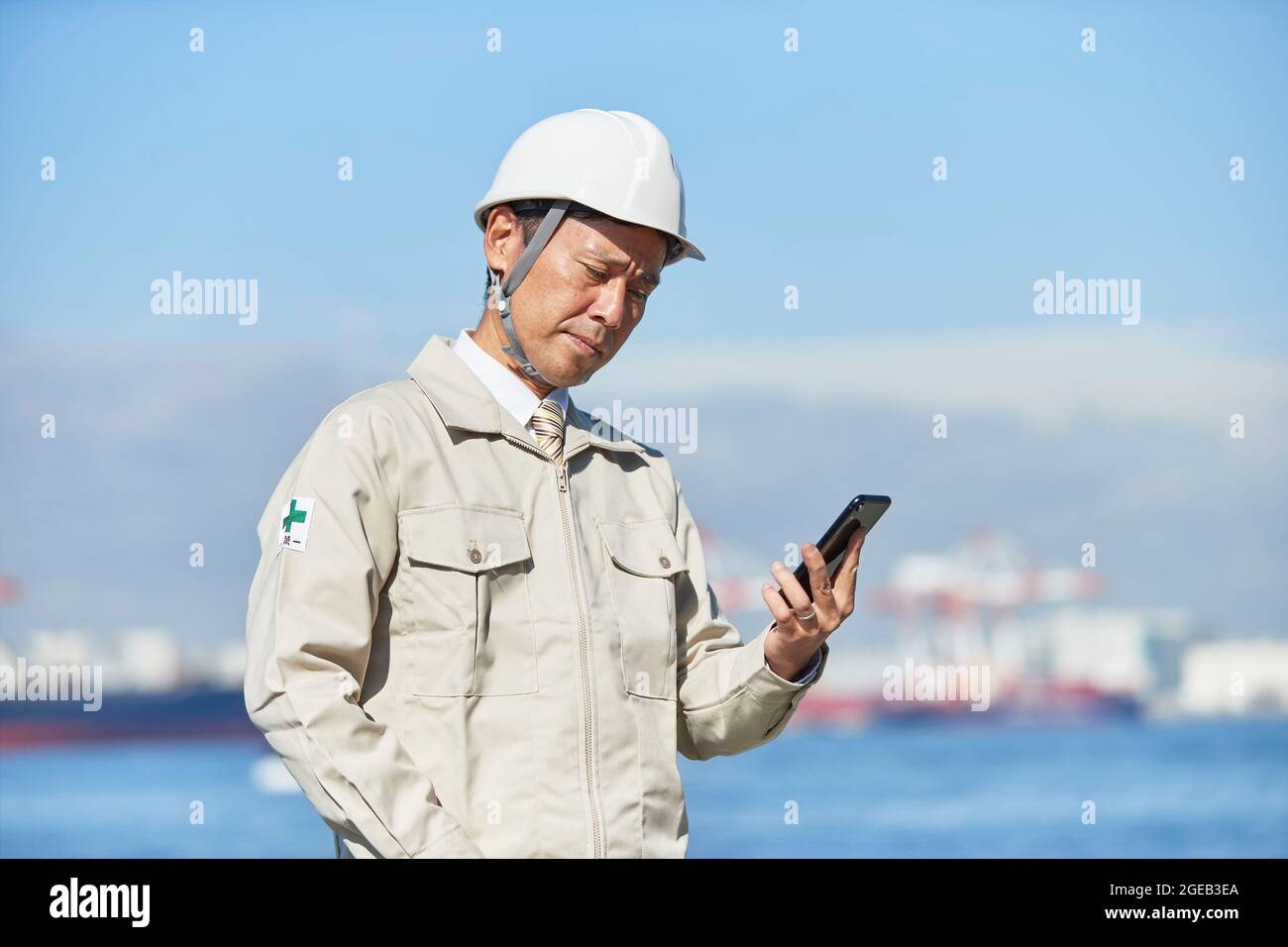 Japanese worker outside Stock Photo - Alamy