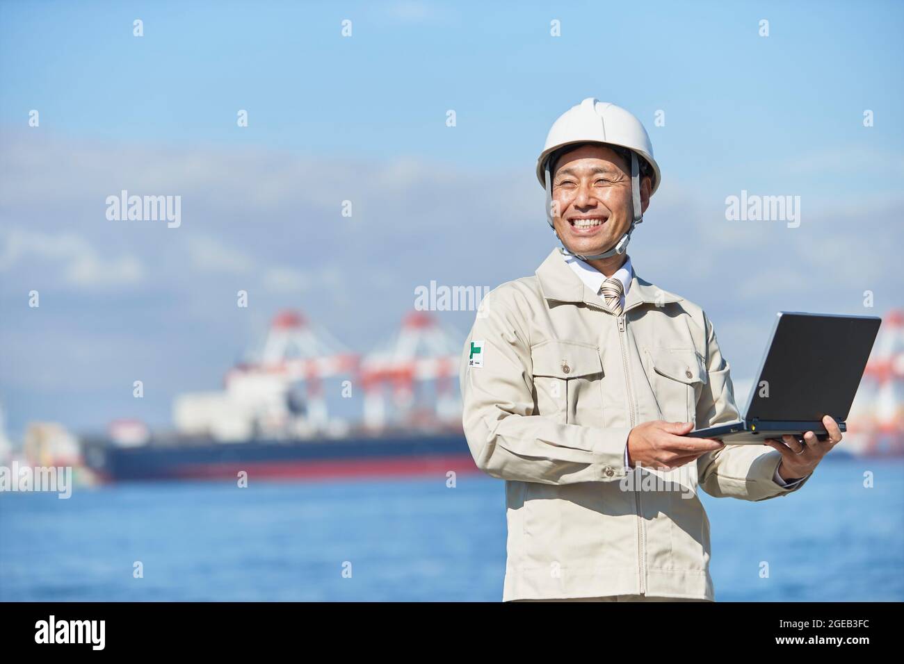 Japanese worker outside Stock Photo - Alamy