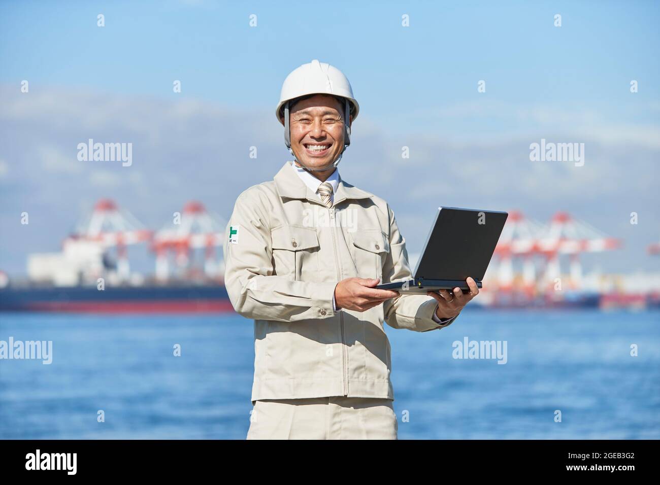 Japanese worker outside Stock Photo - Alamy