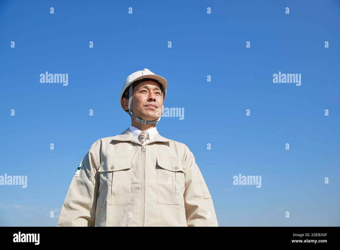 Japanese worker outside Stock Photo - Alamy