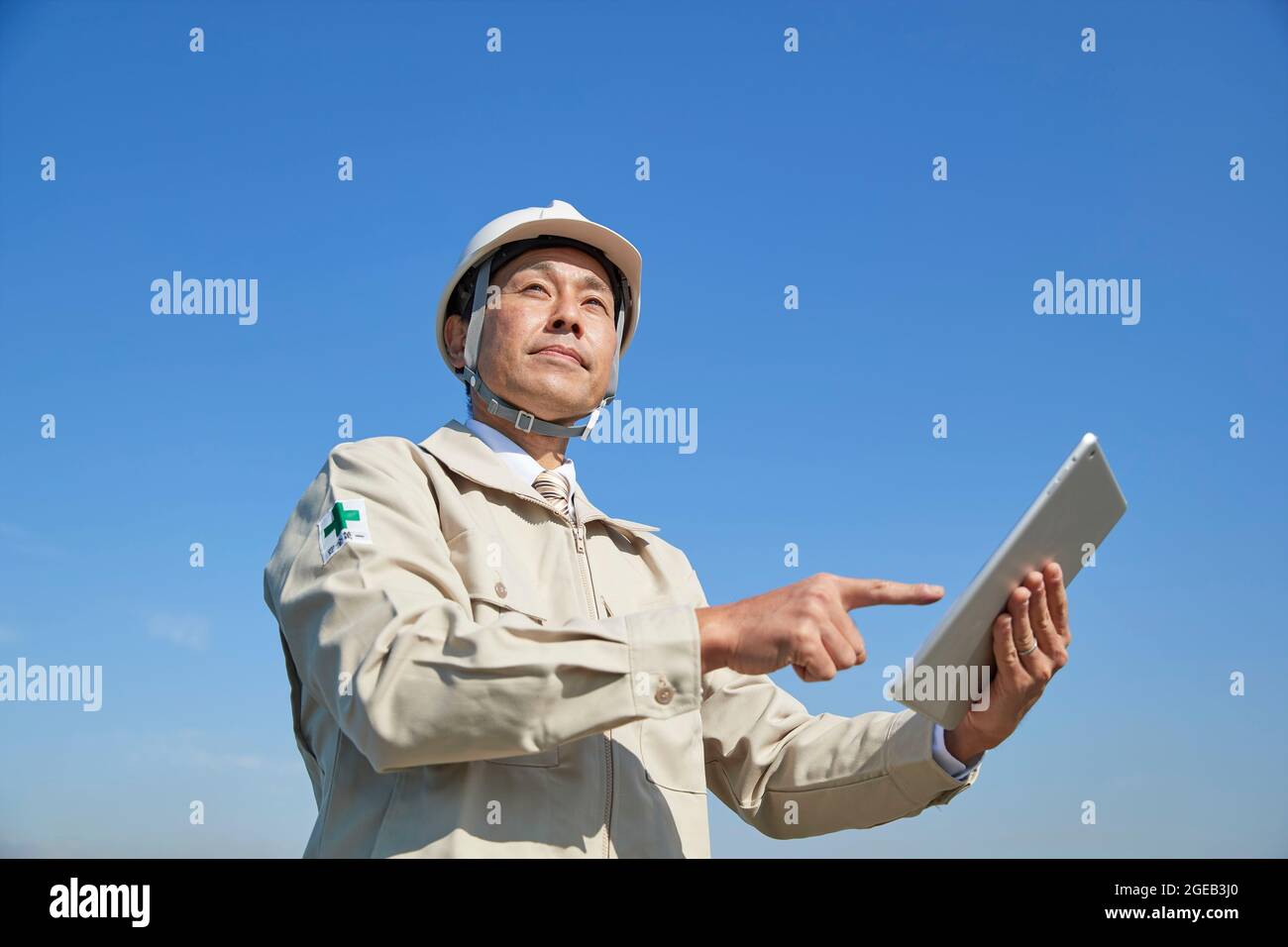 Japanese worker outside Stock Photo - Alamy