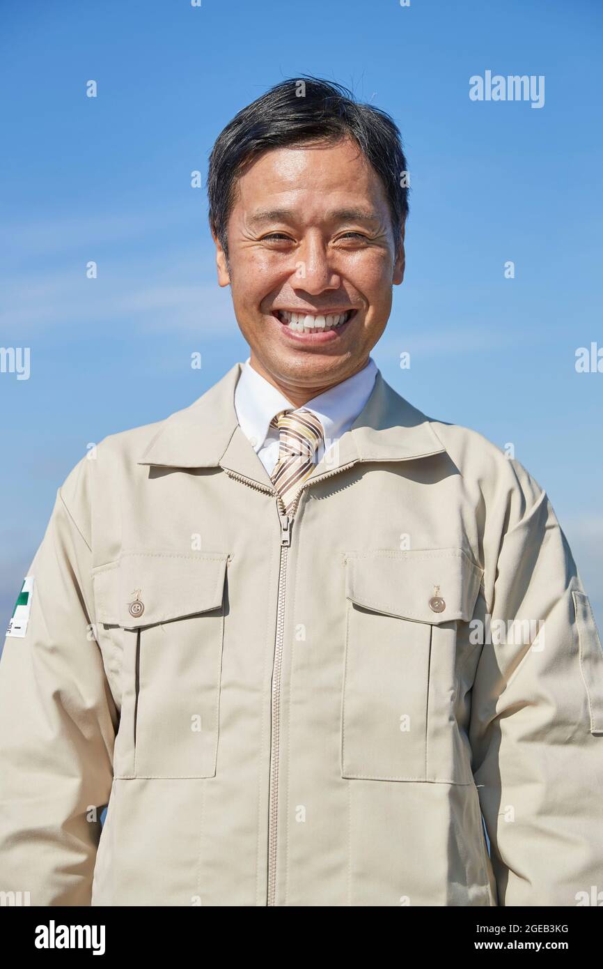 Japanese worker outside Stock Photo - Alamy