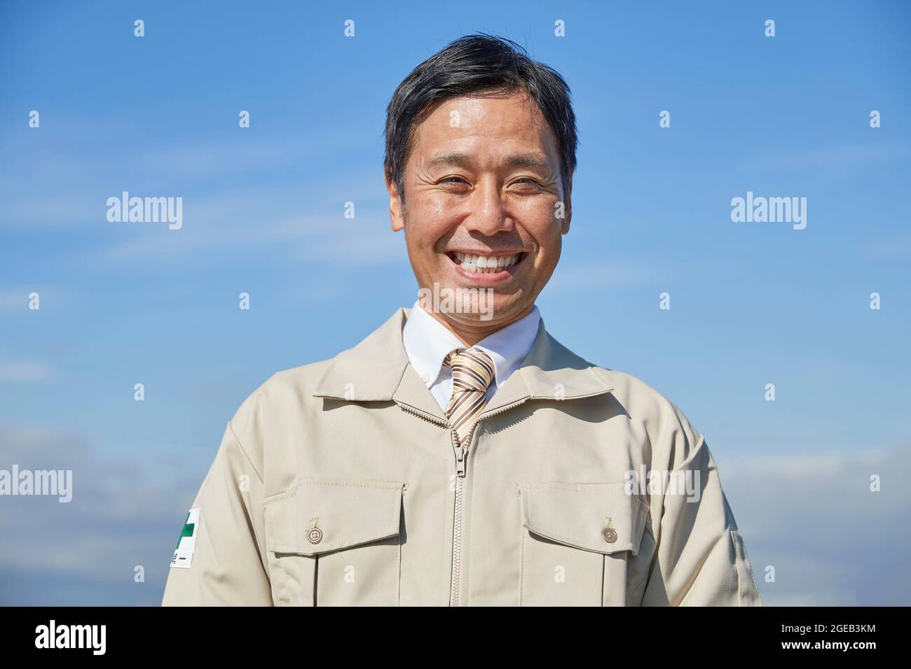 Japanese worker outside Stock Photo - Alamy