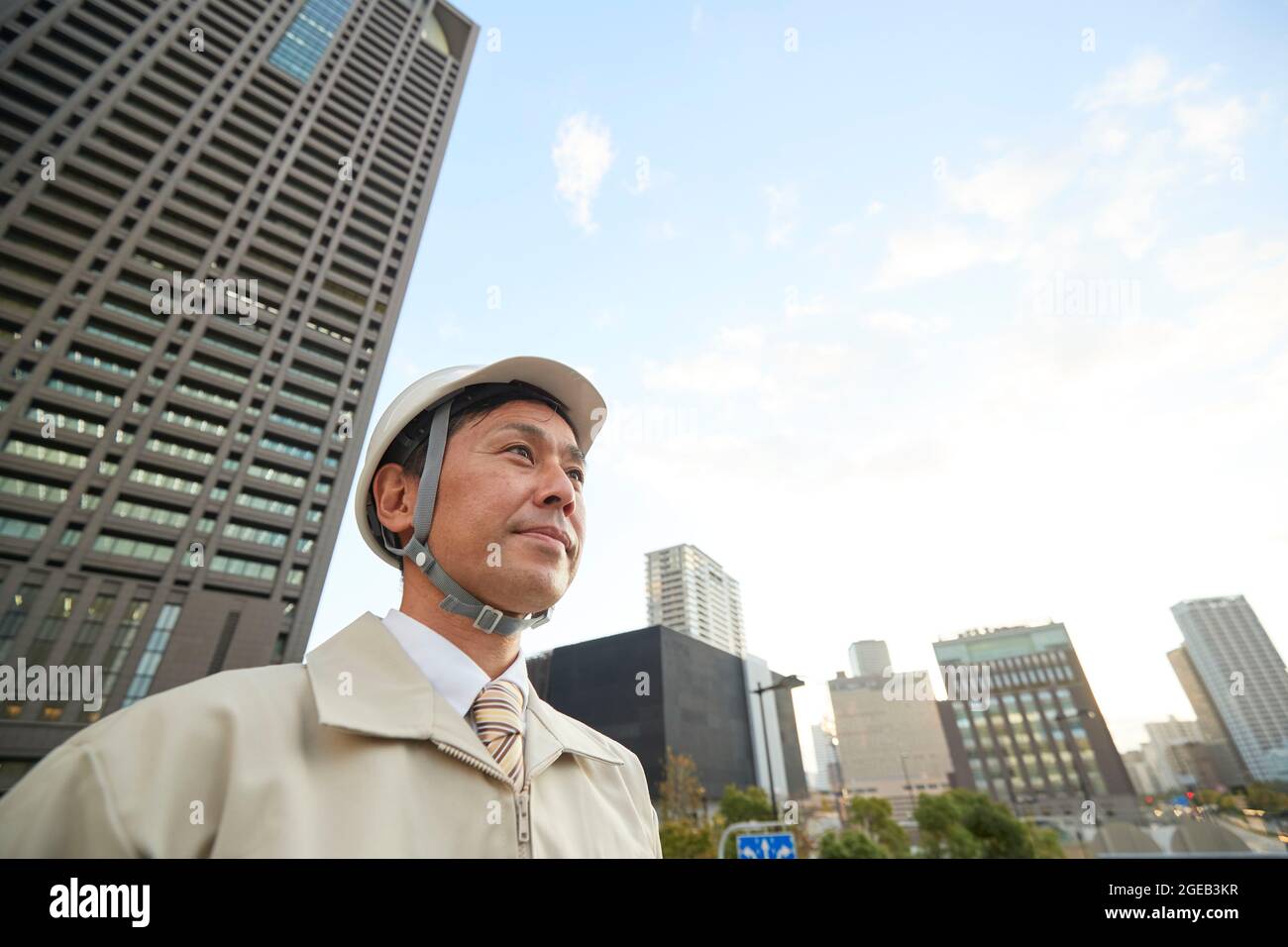 Japanese worker outside Stock Photo - Alamy