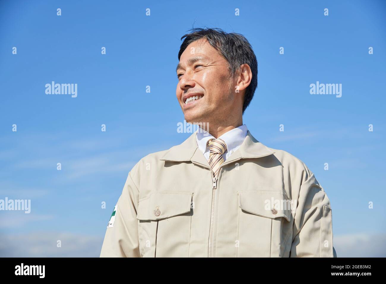 Japanese worker outside Stock Photo - Alamy