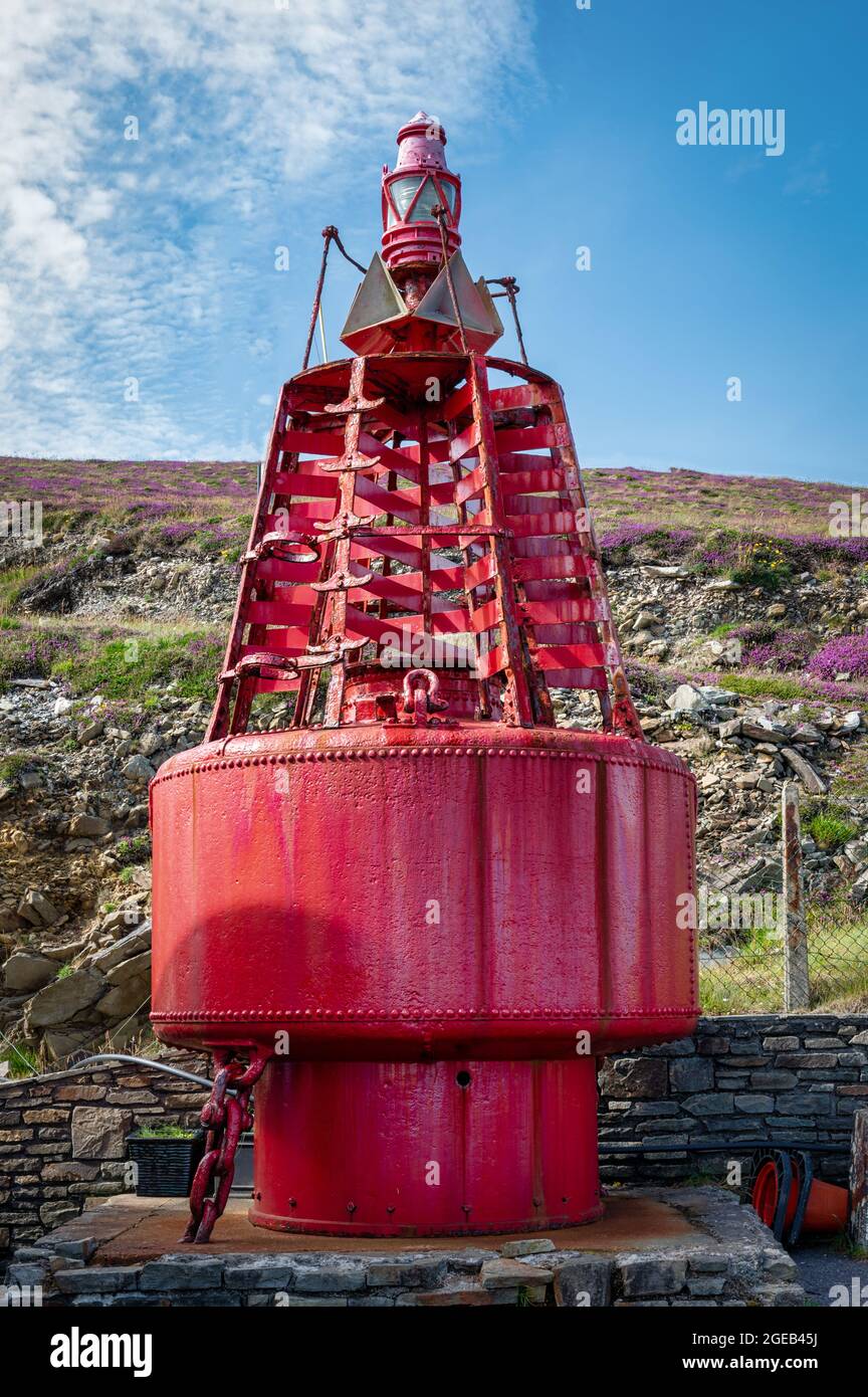 Old rusting red metal sea bouy out of water Stock Photo - Alamy