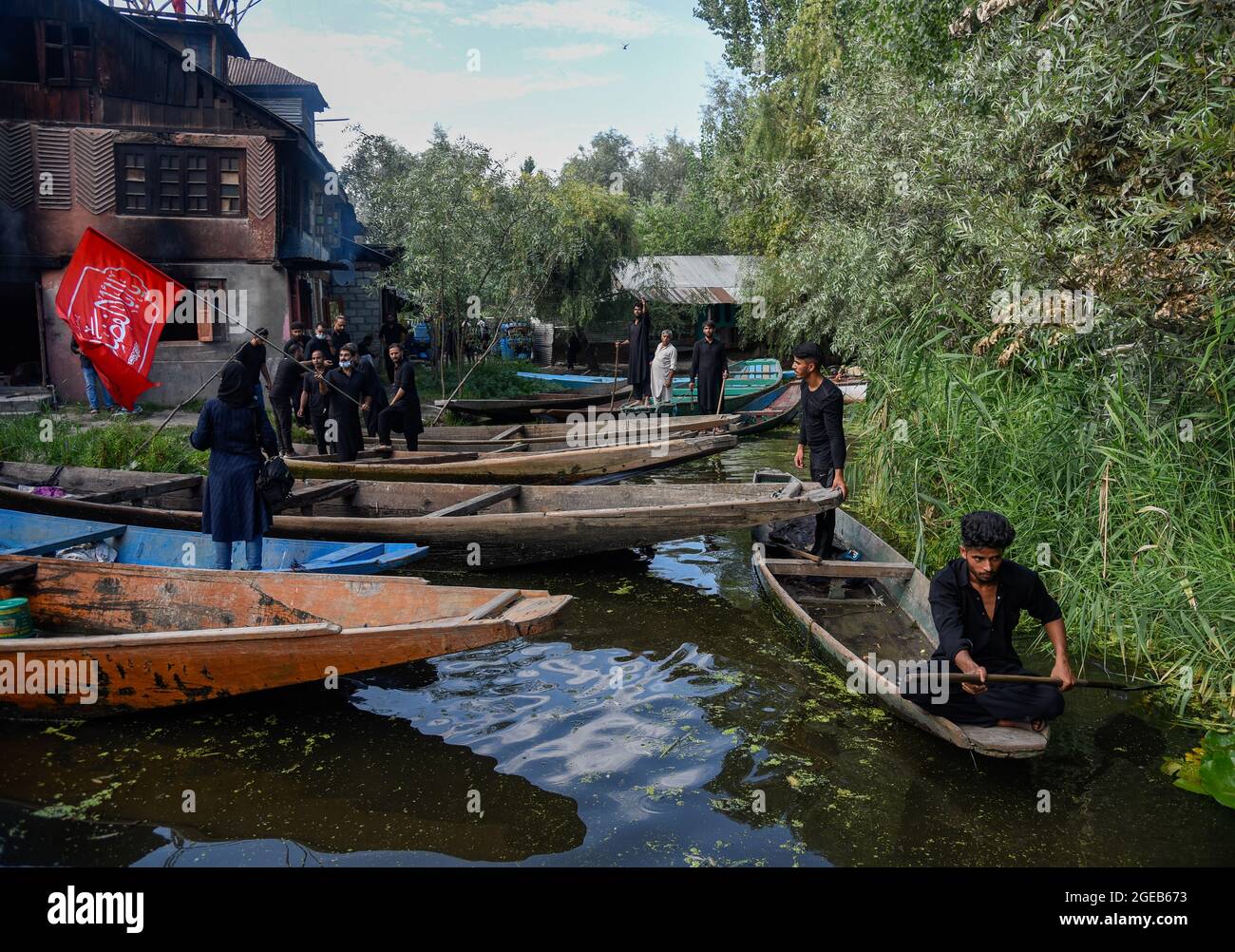 Kashmiri Shia Muslims line up their boats after a muharram procession ...