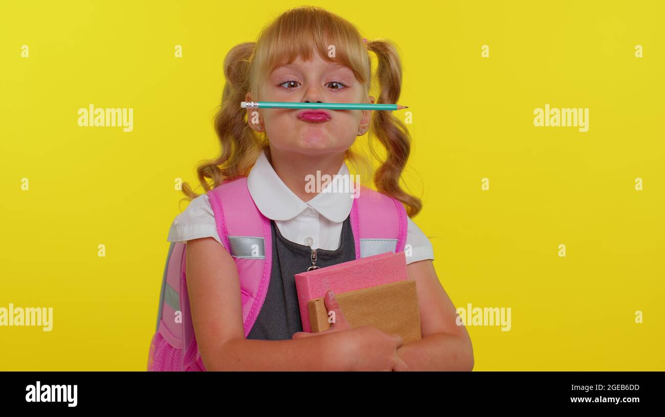 Funny child kid primary school girl making playful silly facial ...