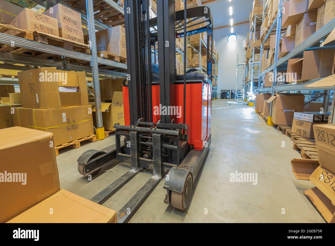 Close up view of storage warehouse. Fork lift truck in warehouse store ...