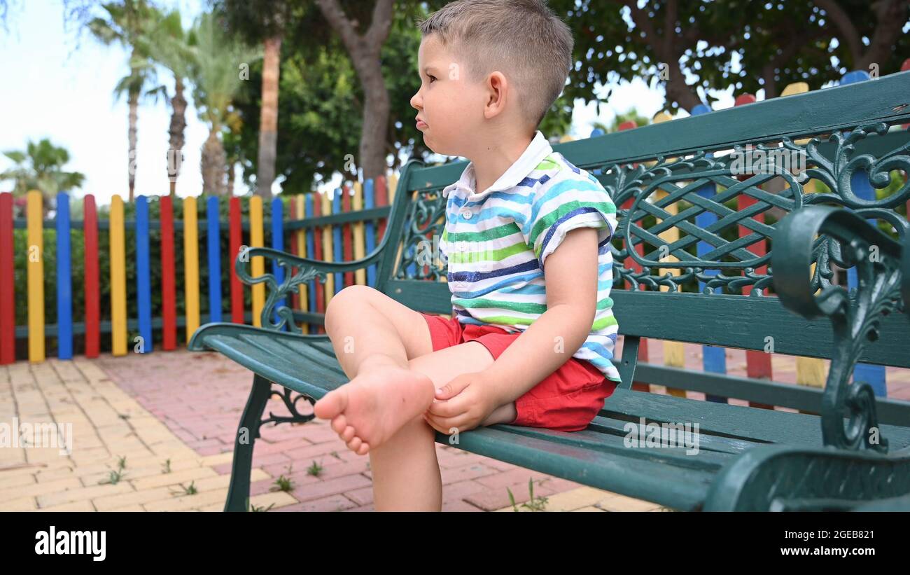 A child injured his foot while playing in the playground Stock Photo ...