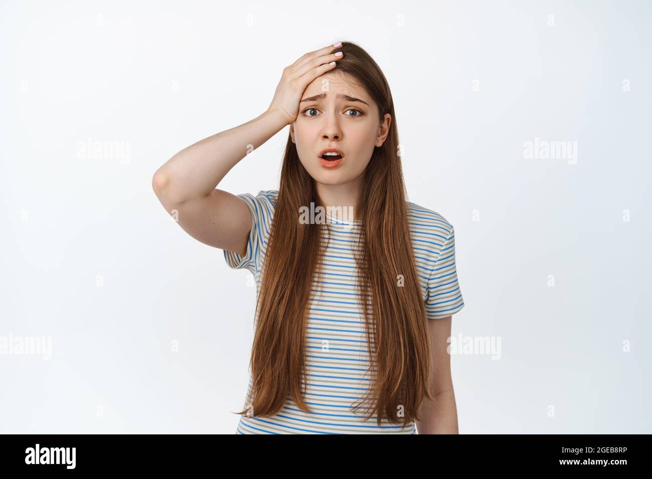 Young woman distressed face holding hi-res stock photography and images ...