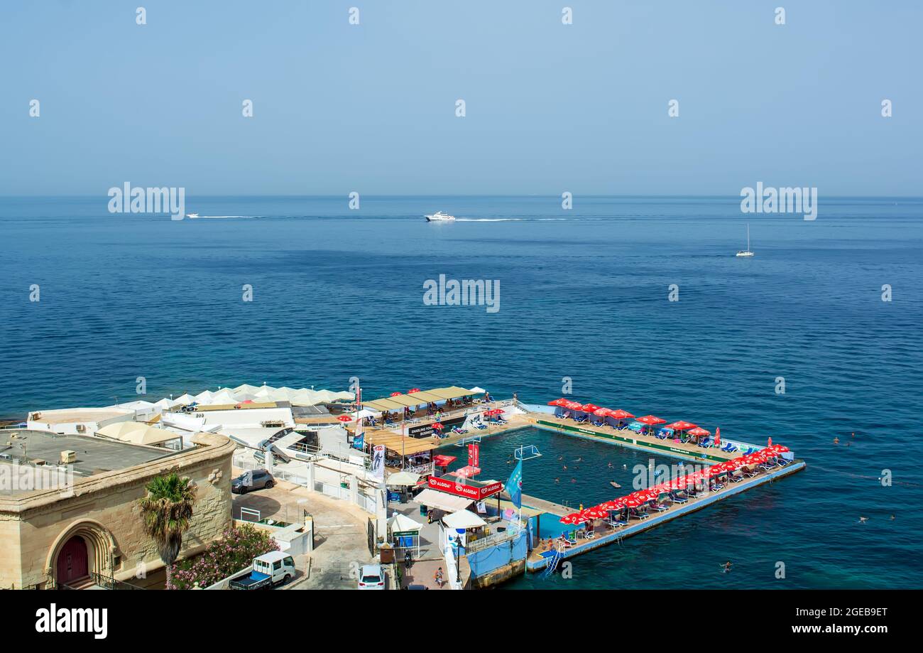Public open-air sea water swimming pool on the Sliema beach Stock Photo ...