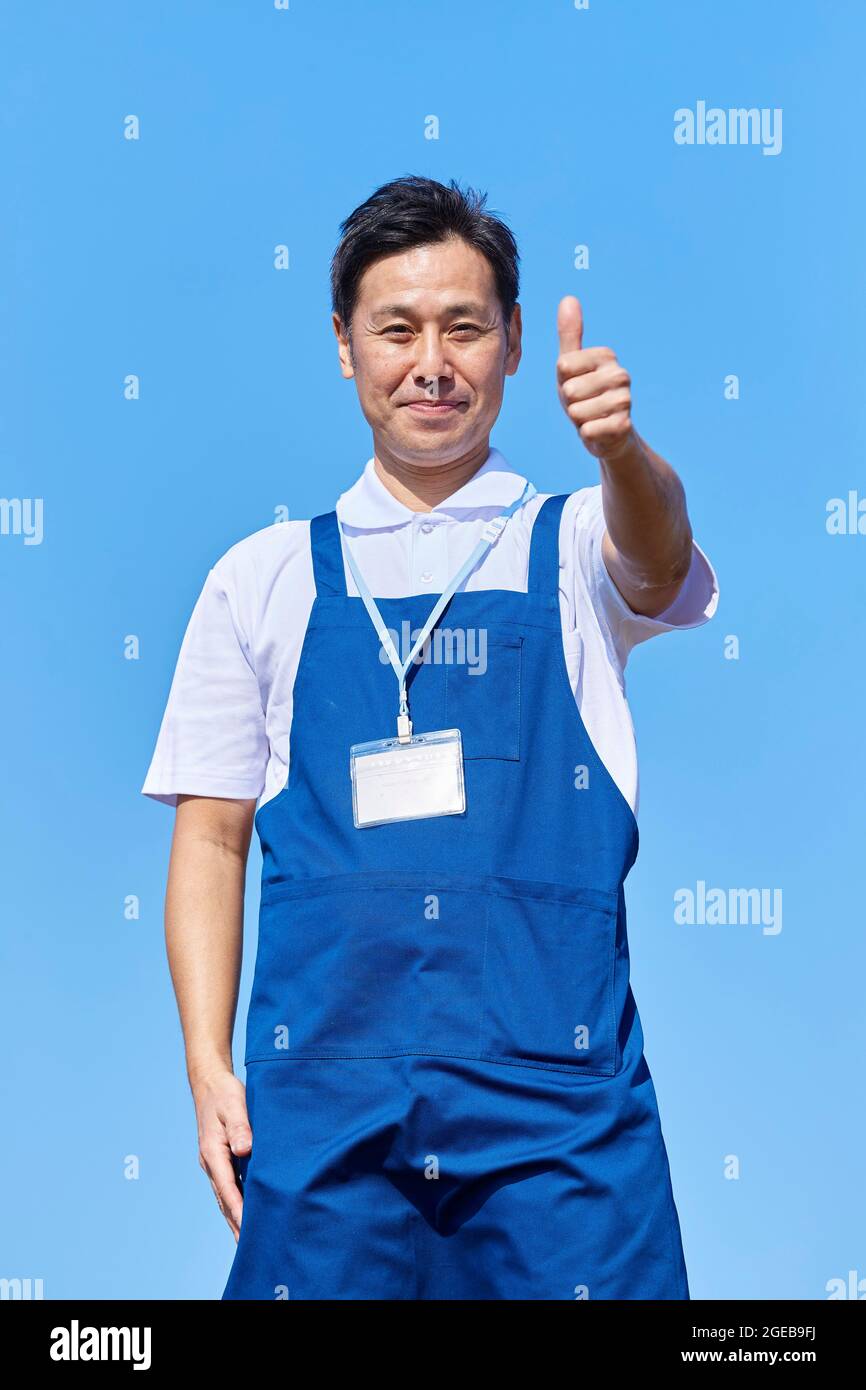Japanese worker outside Stock Photo - Alamy