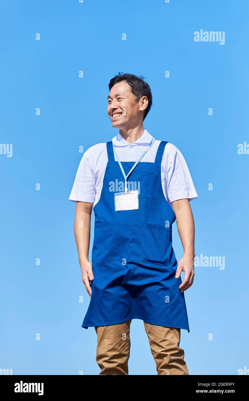 Japanese worker outside Stock Photo - Alamy