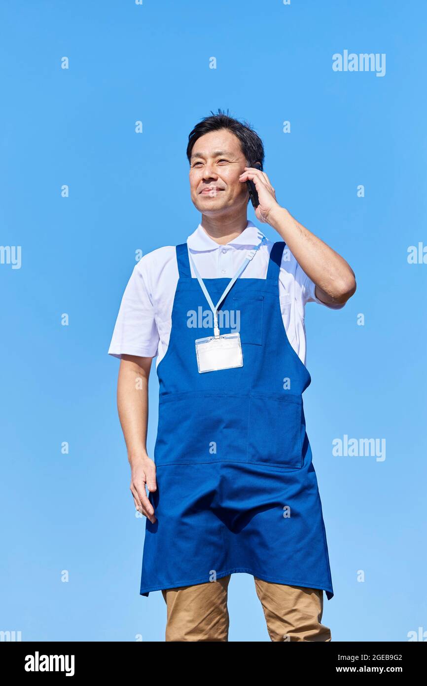 Japanese worker outside Stock Photo - Alamy