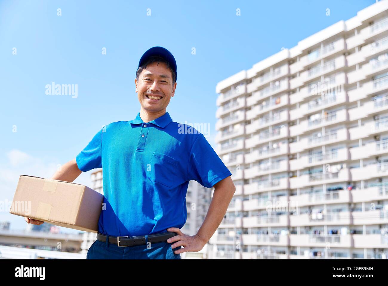 Japanese delivery man outside Stock Photo - Alamy