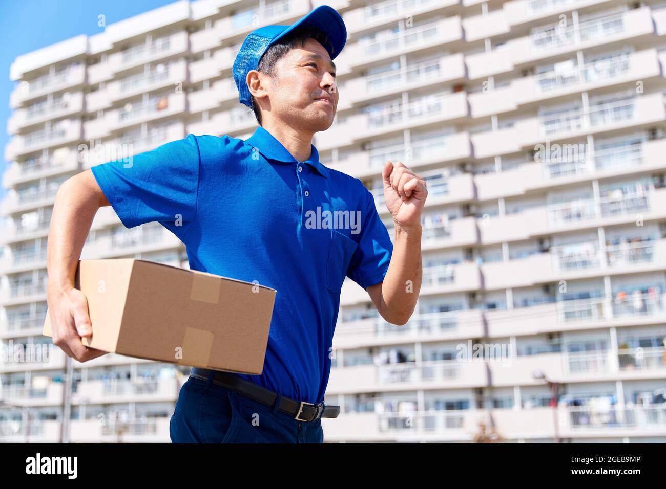 Japanese delivery man outside Stock Photo - Alamy