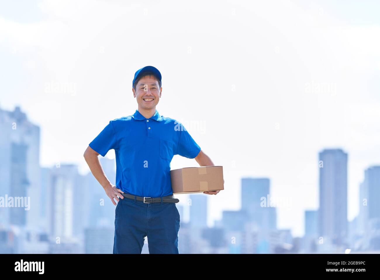 Japanese delivery man outside Stock Photo - Alamy
