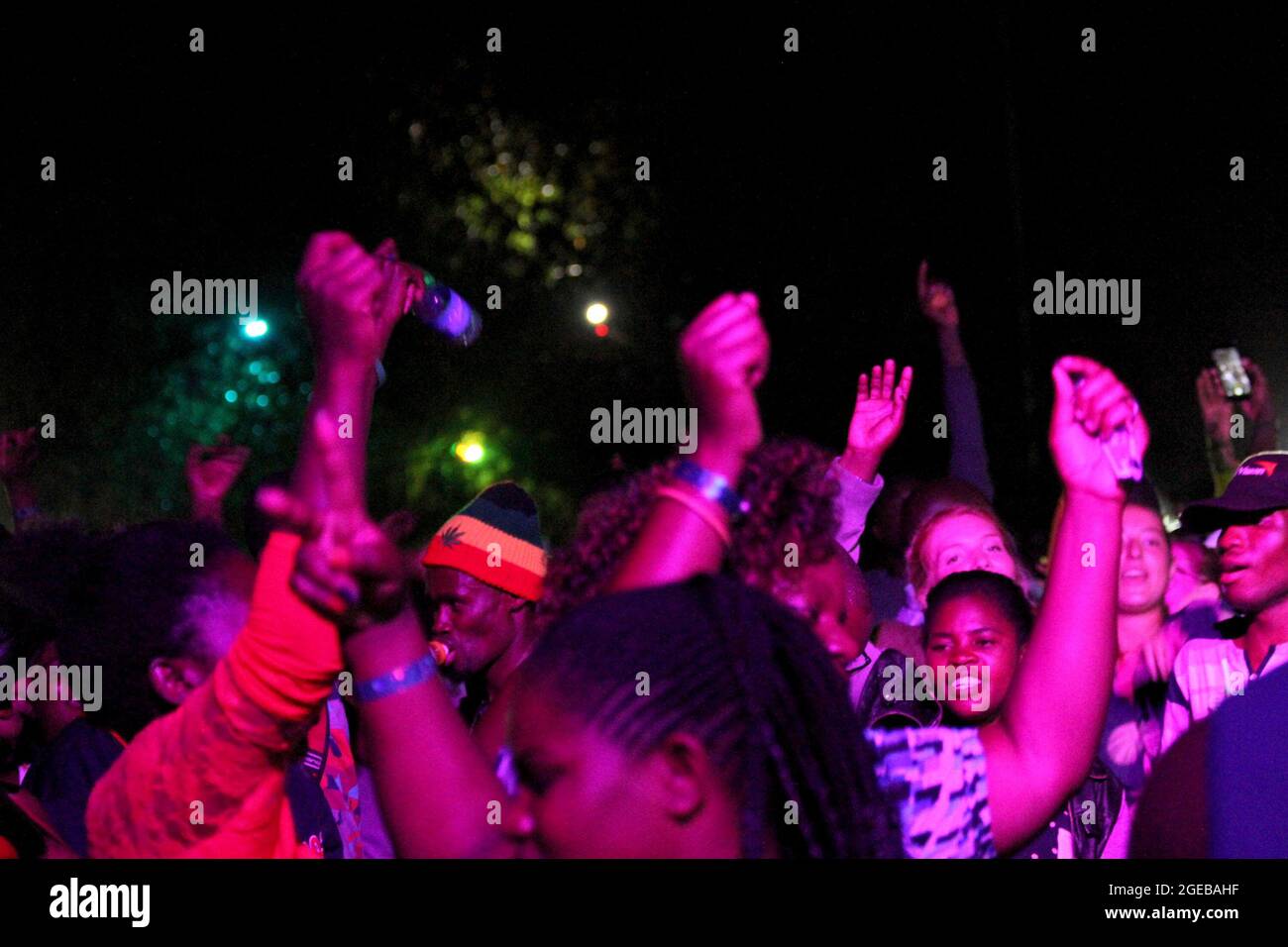People are seen dancing at a music festival at Senga Bay, Salima on ...