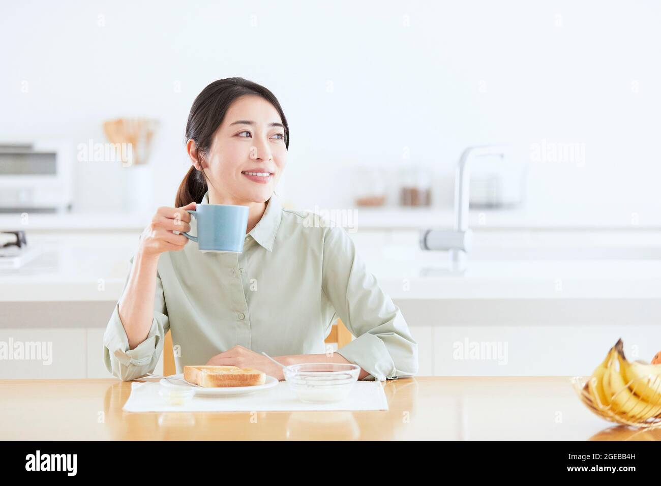 Japanese woman enjoying time at home Stock Photo - Alamy