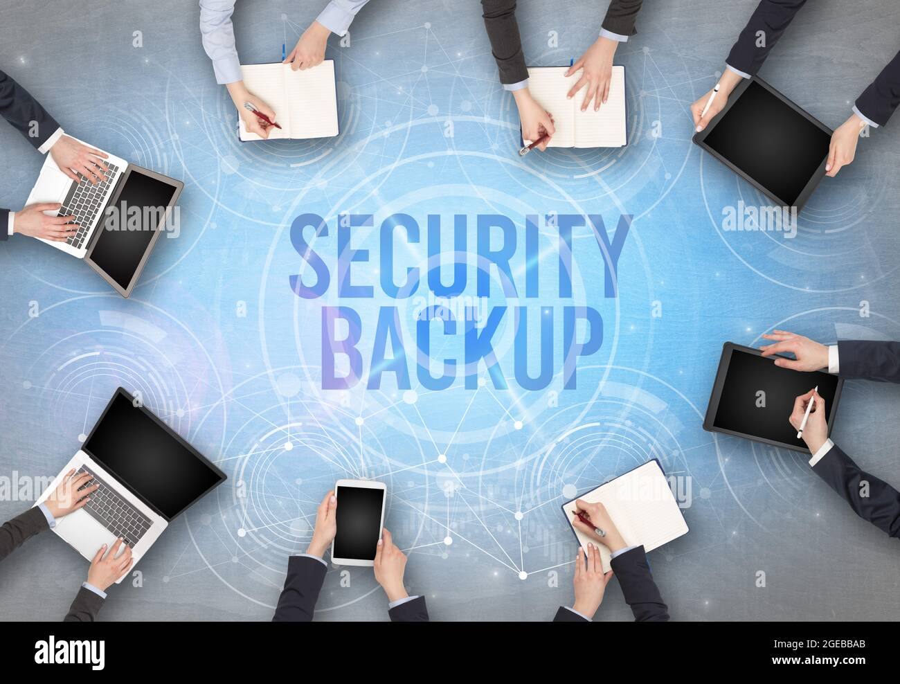 Group of people in front of a laptop, security concept Stock Photo - Alamy