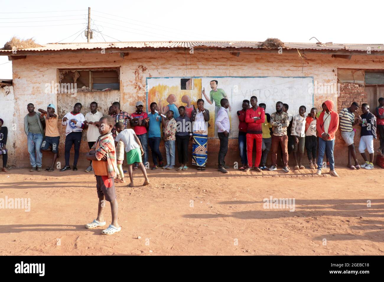 People are seen as they watch a performance from a distance at a music ...