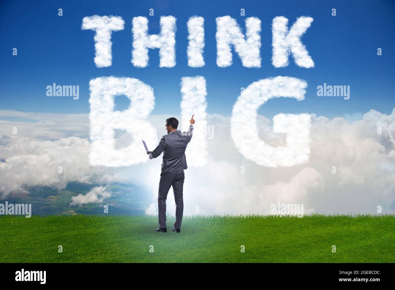 Think big concept with the businessman Stock Photo - Alamy