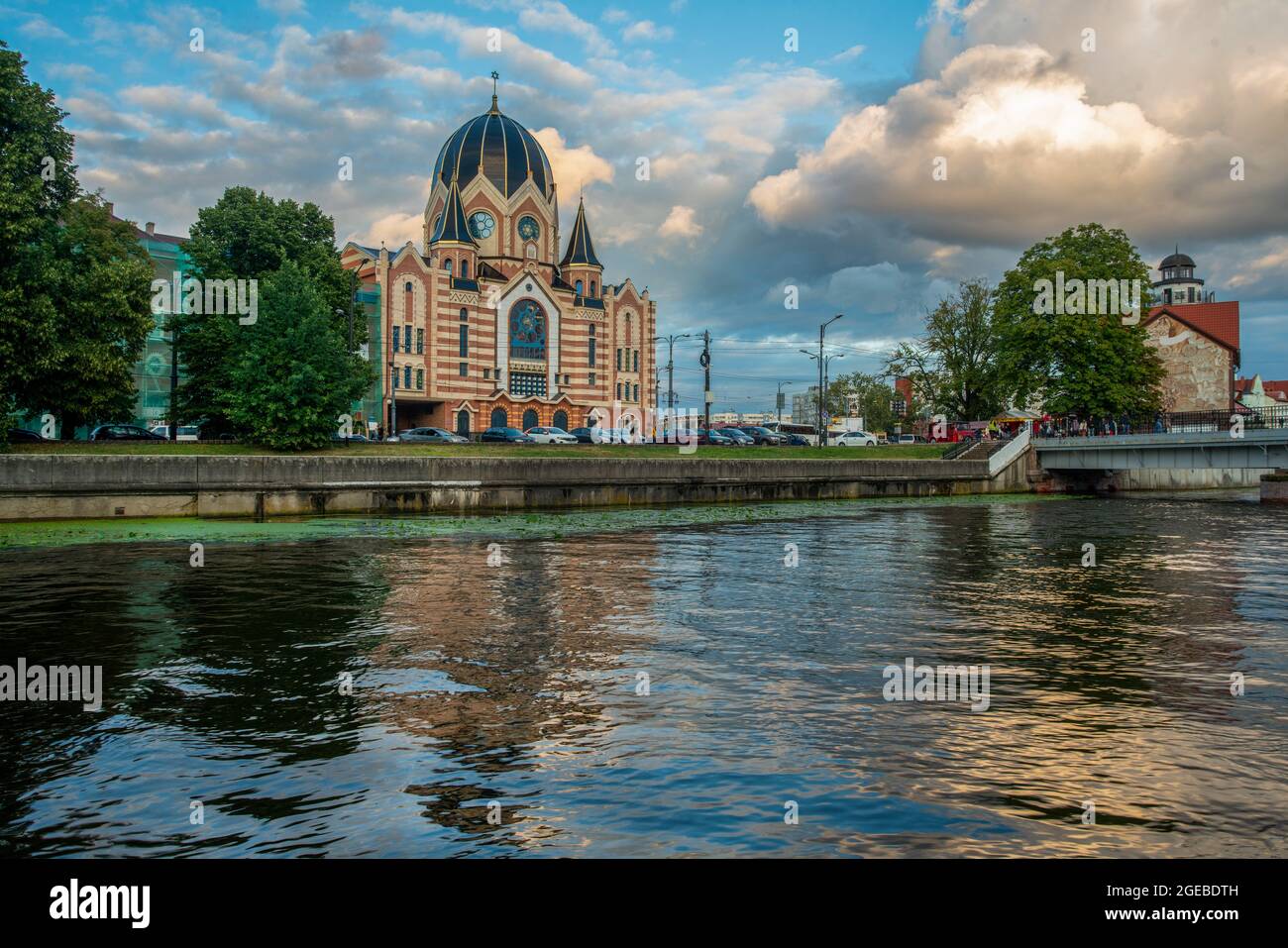 Amazing evening panorama with synagogue in Kaliningrad anf boat in ...