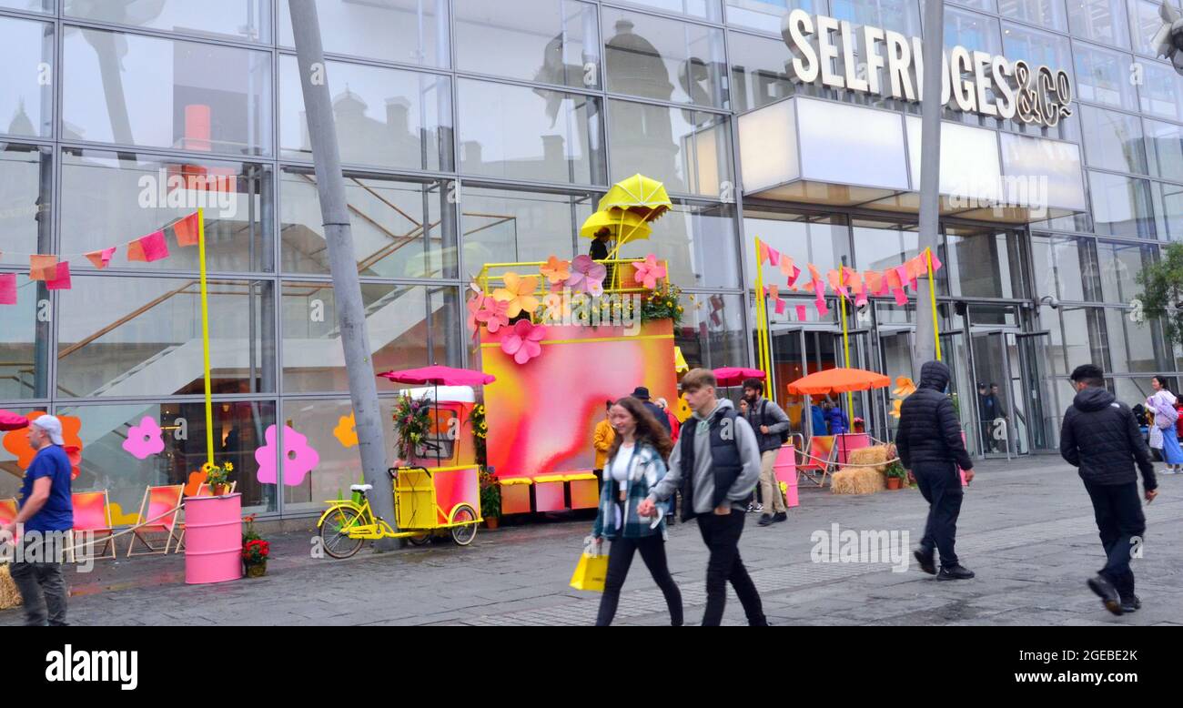 A colourful Summer vibe display of deckchairs and a float emitting ...