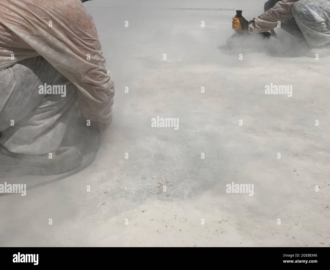 Construction workers are grinding concrete surface Stock Photo - Alamy