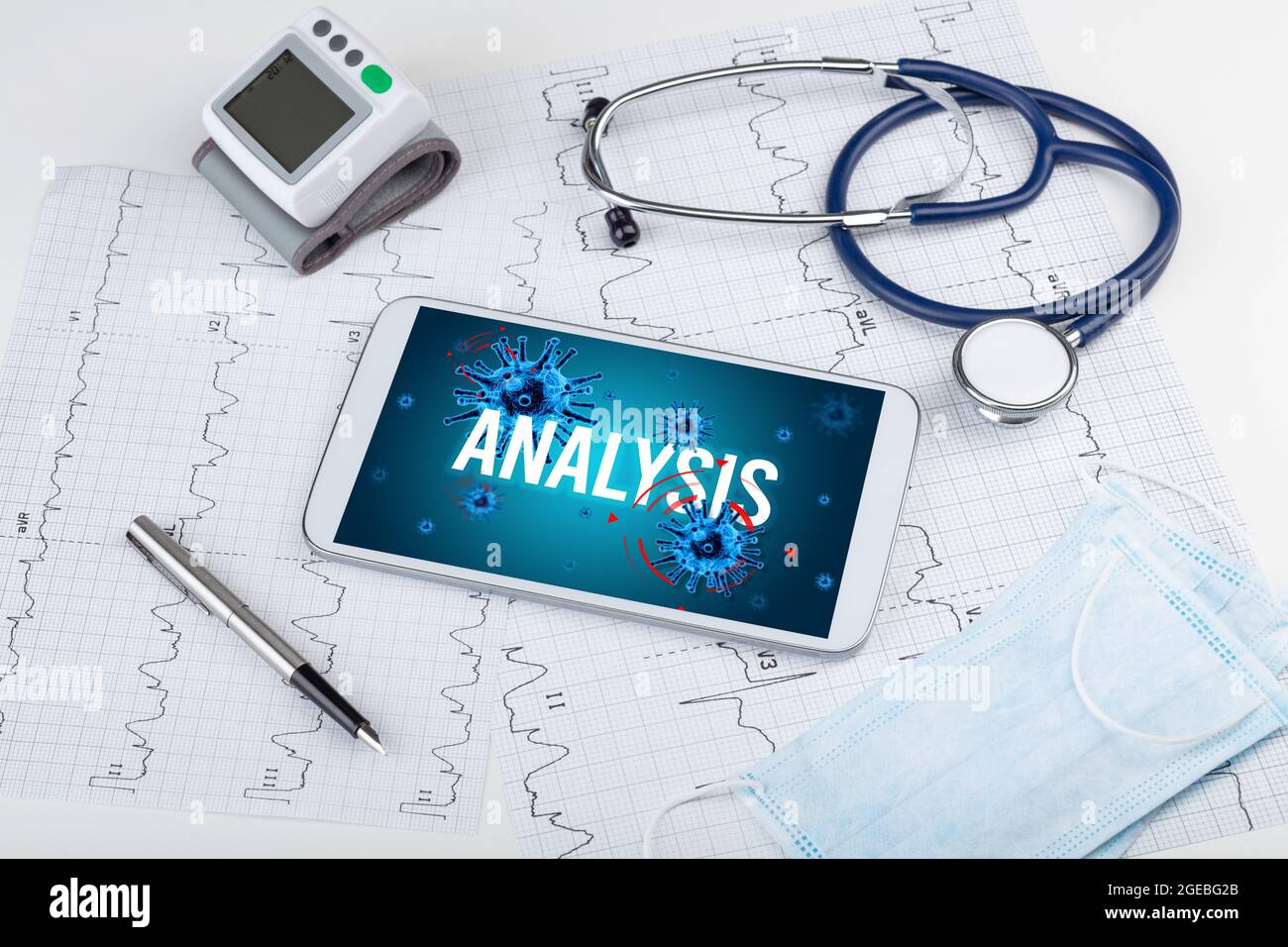 Tablet pc and doctor tools on white surface Stock Photo - Alamy