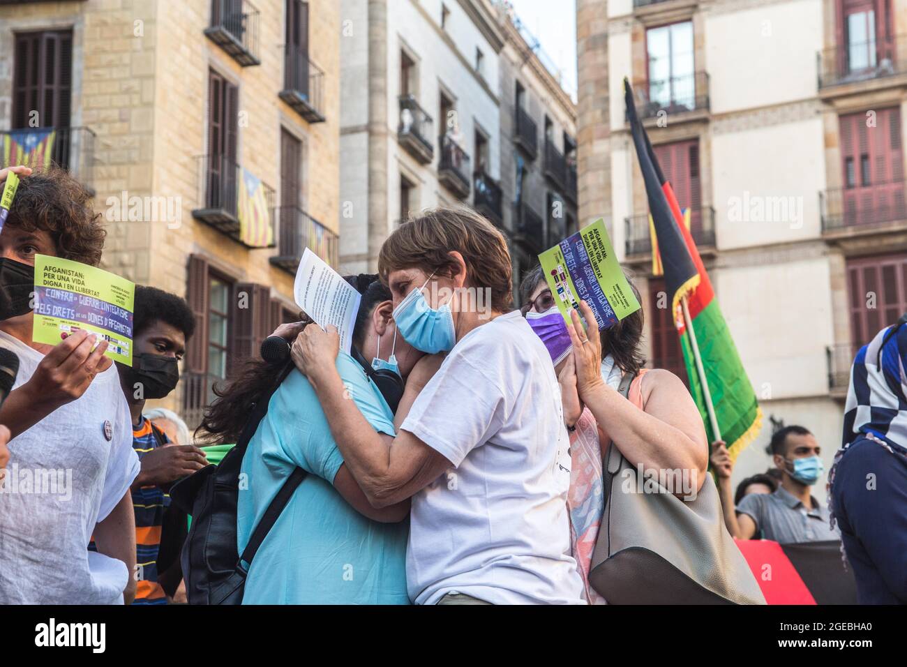 Barcelona, Spain. 18th Aug, 2021. Protesters in tears console each ...