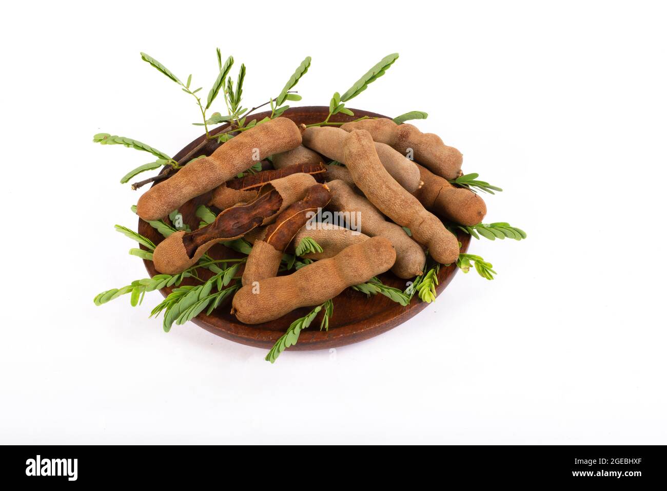 fruit tamarindus indica Sweet tamarind fruit in a basket, white ...