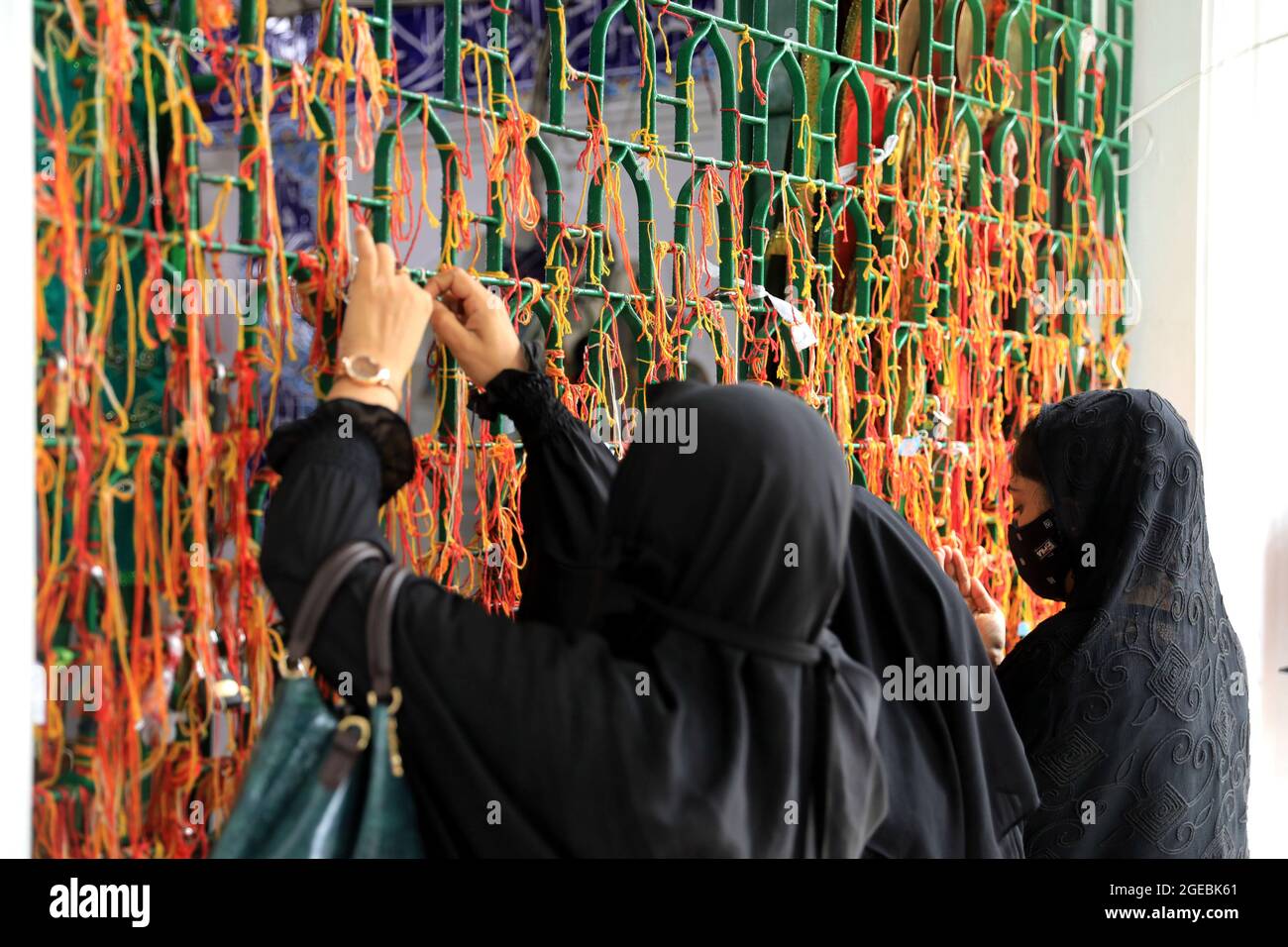 Dhaka, Bangladesh, August 18, 2021: Muslim women tie the Tajia as ...