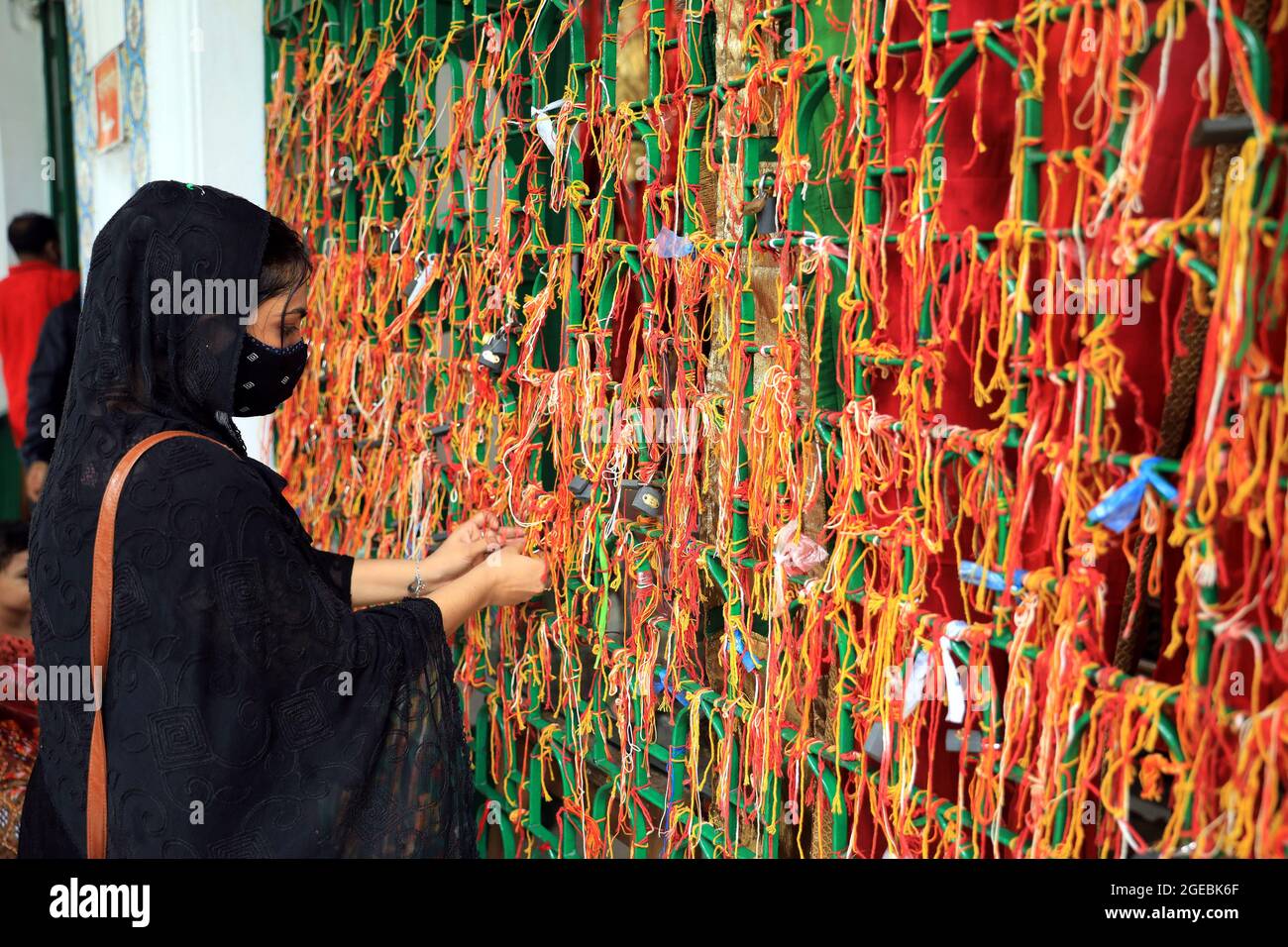 Dhaka, Bangladesh, August 18, 2021: Muslim women tie the Tajia as ...