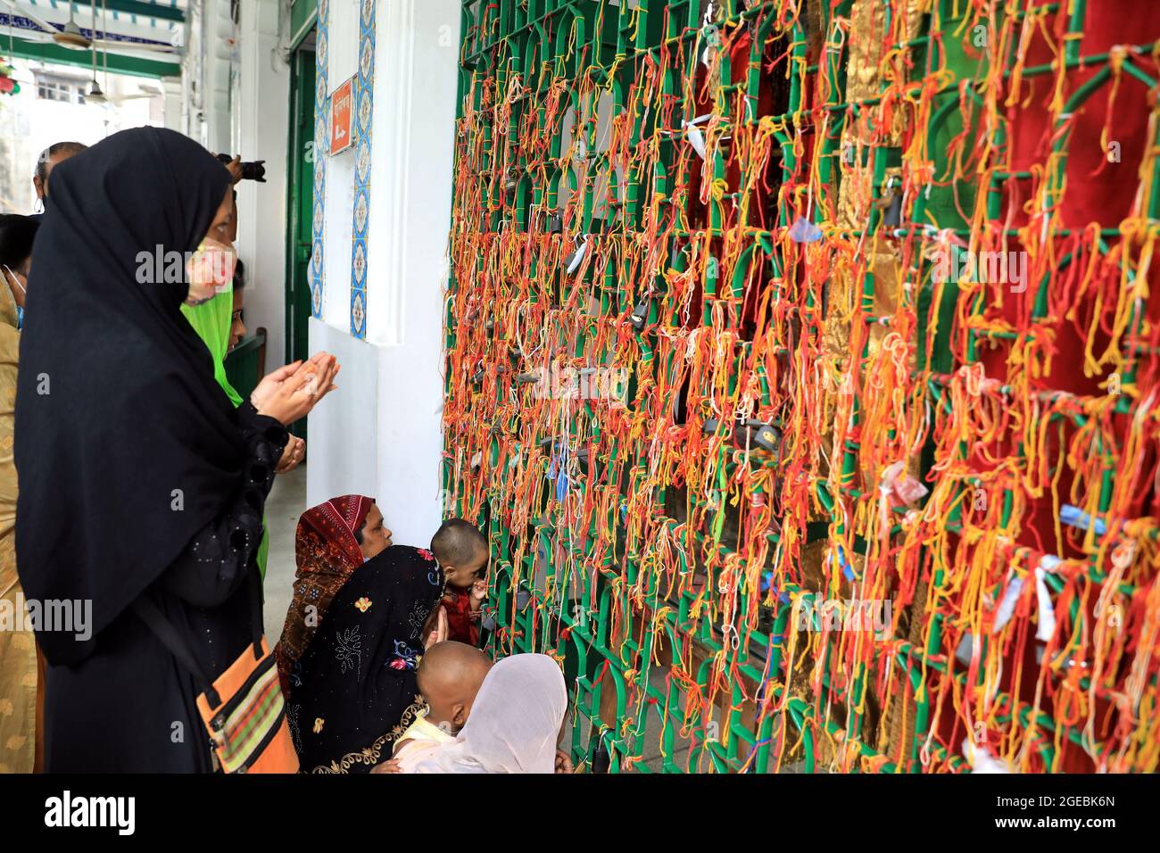 Dhaka, Bangladesh, August 18, 2021: Muslim women tie the Tajia as ...