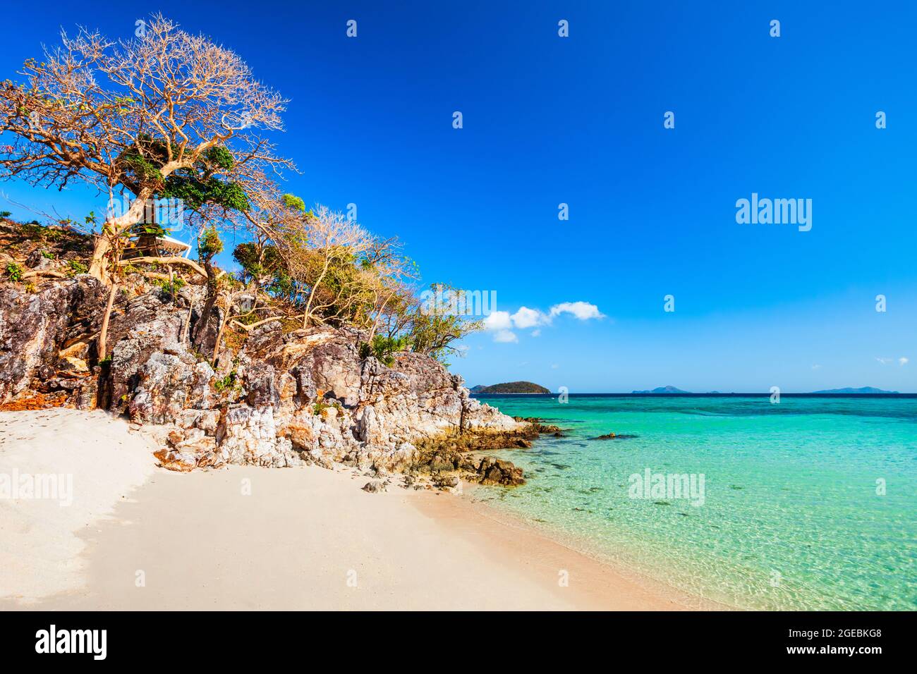 Beauty rocky beach with yellow sand and turquoise water in Busuanga ...