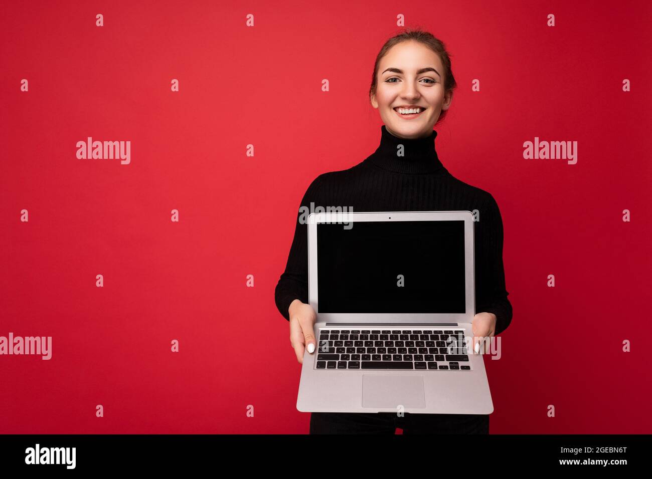 Close-up portrait of Beautiful smiling happy young woman with gathered ...