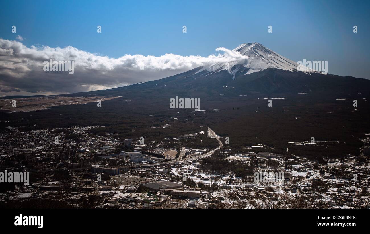 Beautiful Fuji mountain with snow cover on the top with cloud, landmark ...