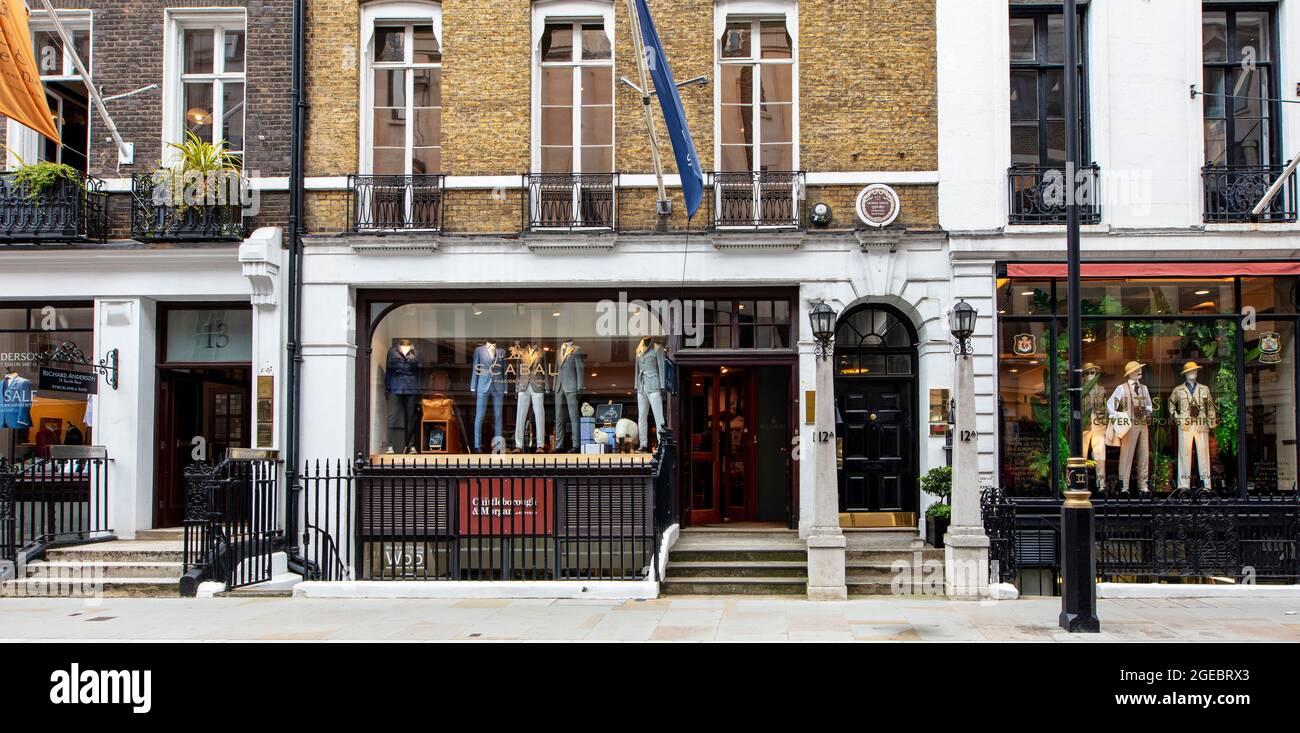 Store frontages of bespoke tailoring houses in Savile Row, London; a ...