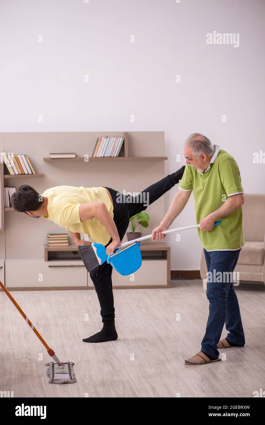 Happy janitor cleaning team hi-res stock photography and images - Alamy