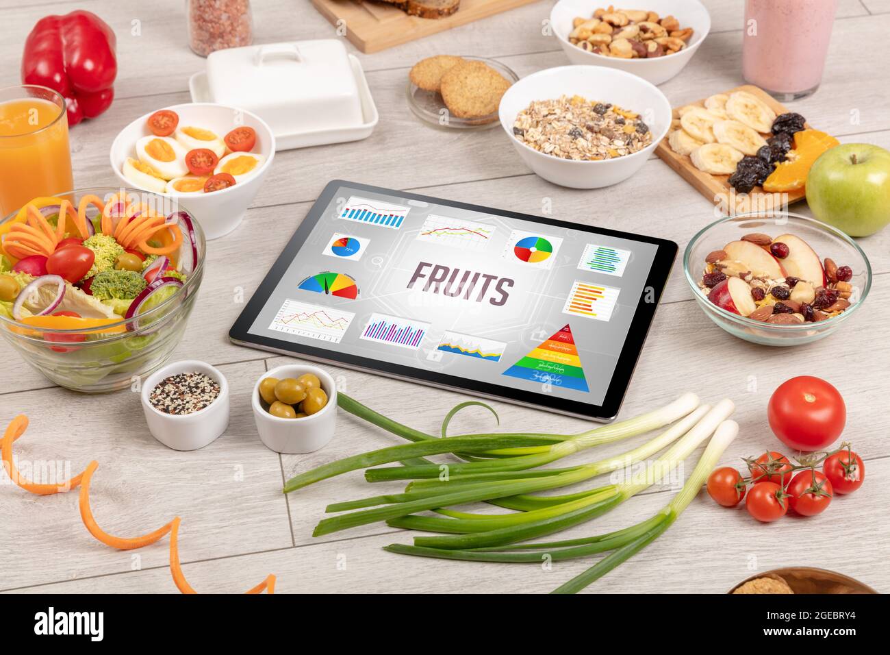 Organic food and tablet pc Stock Photo - Alamy