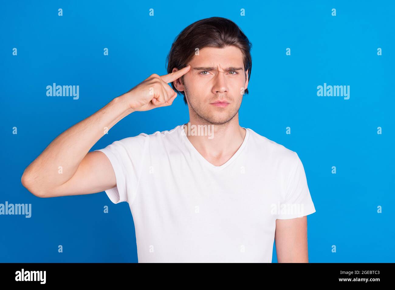 Finger at forehead hi-res stock photography and images - Alamy