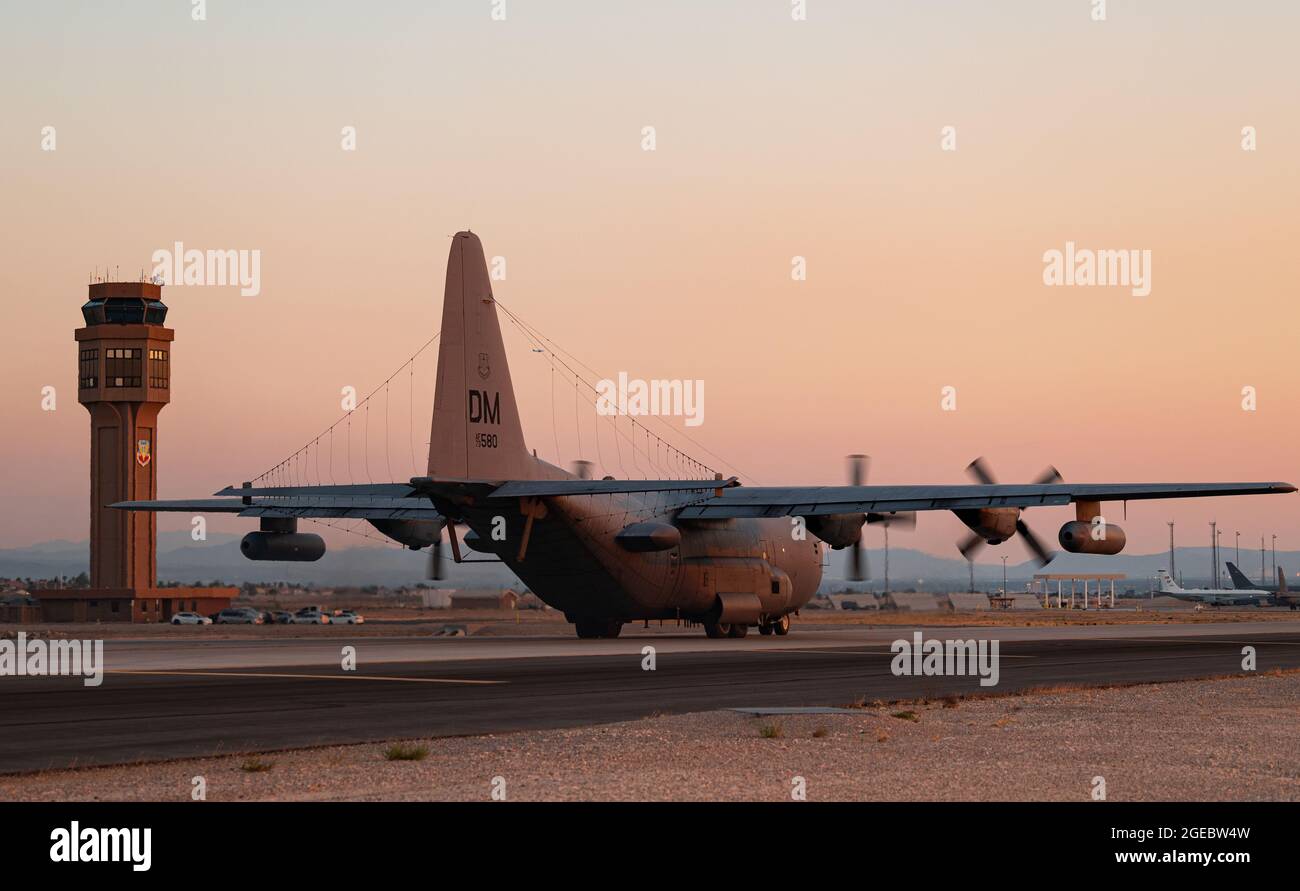An EC-130H Compass Call assigned to Davis Monthan Air Force Base, taxis ...